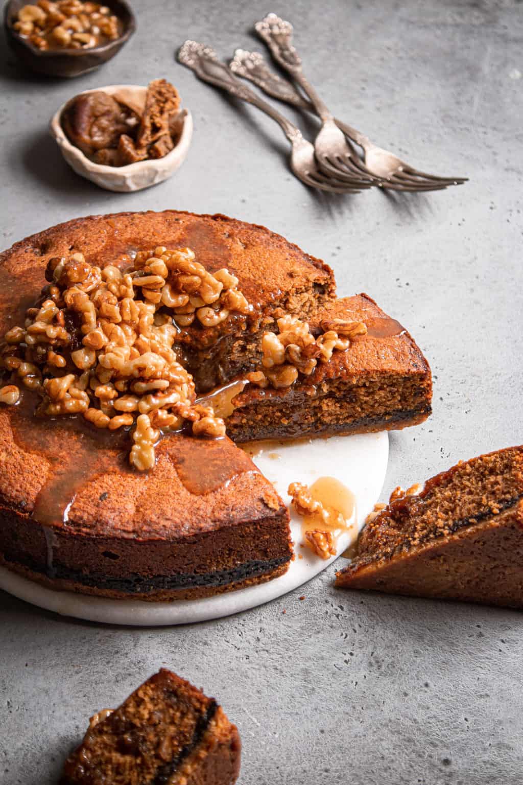 Fig Cake soft and tender fig cake topped with walnuts in honey syrup.