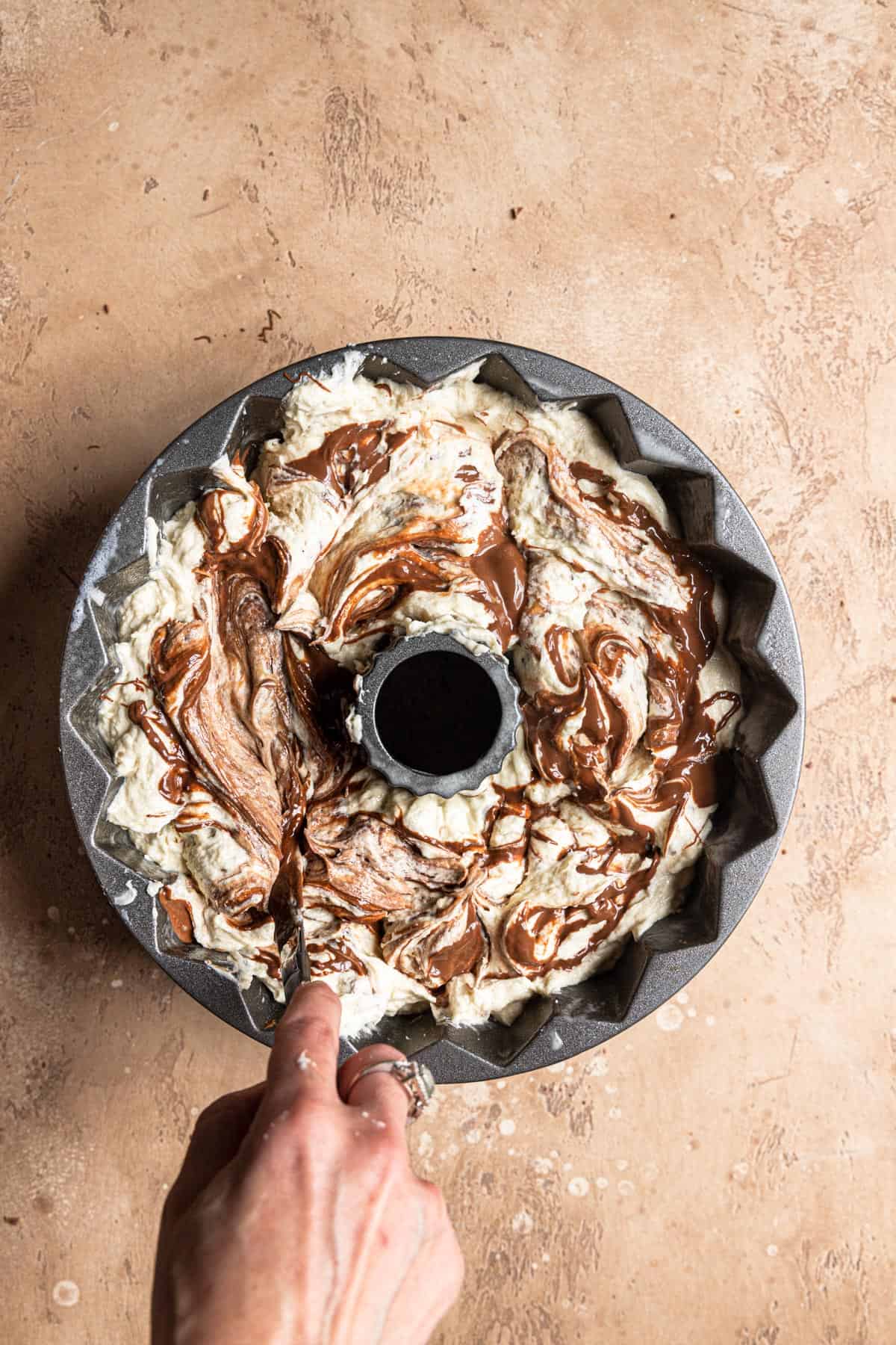 Snickers Bundt cake has the perfect buttery, tender, and fluffy texture